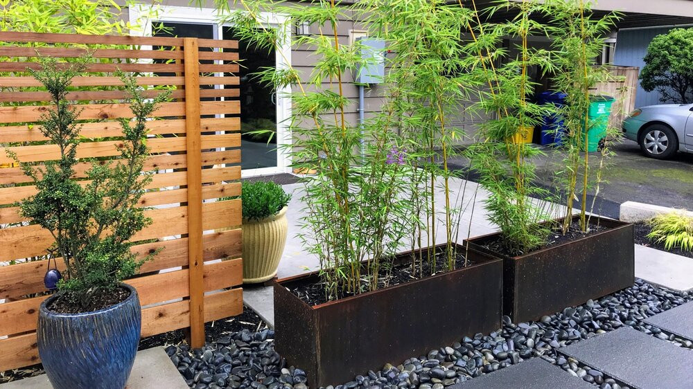 20 Shimmering Garden Ideas That Incorporate Metal Accents In Landscape ...